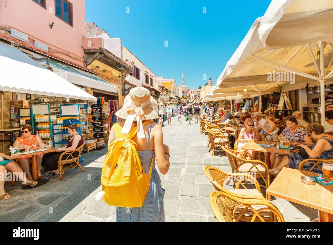 27 May 2019, Rhodes, Greece: Crowds of tourists walking and shopping at ...