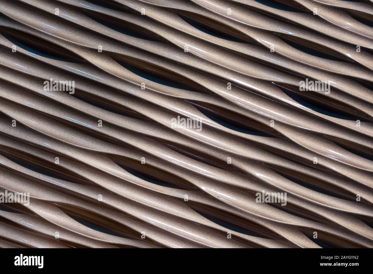 Brown plastic panel with a wavy texture. Brown background for design ...
