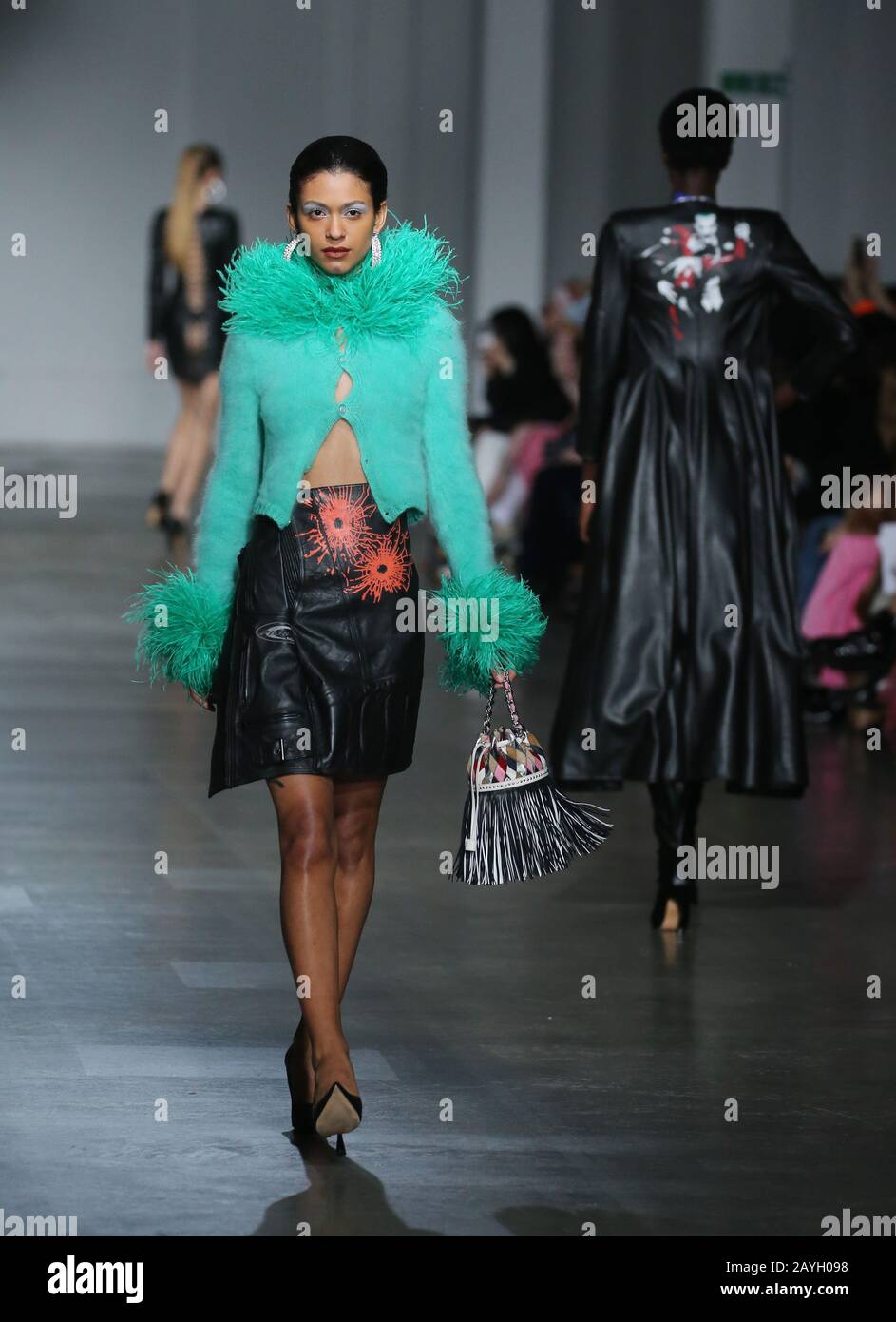 Models on the catwalk during the Mimi Wade at the London Fashion Week ...