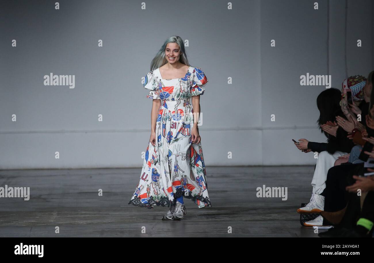 Designer Mimi Wade acknowledges the audience following the catwalk ...