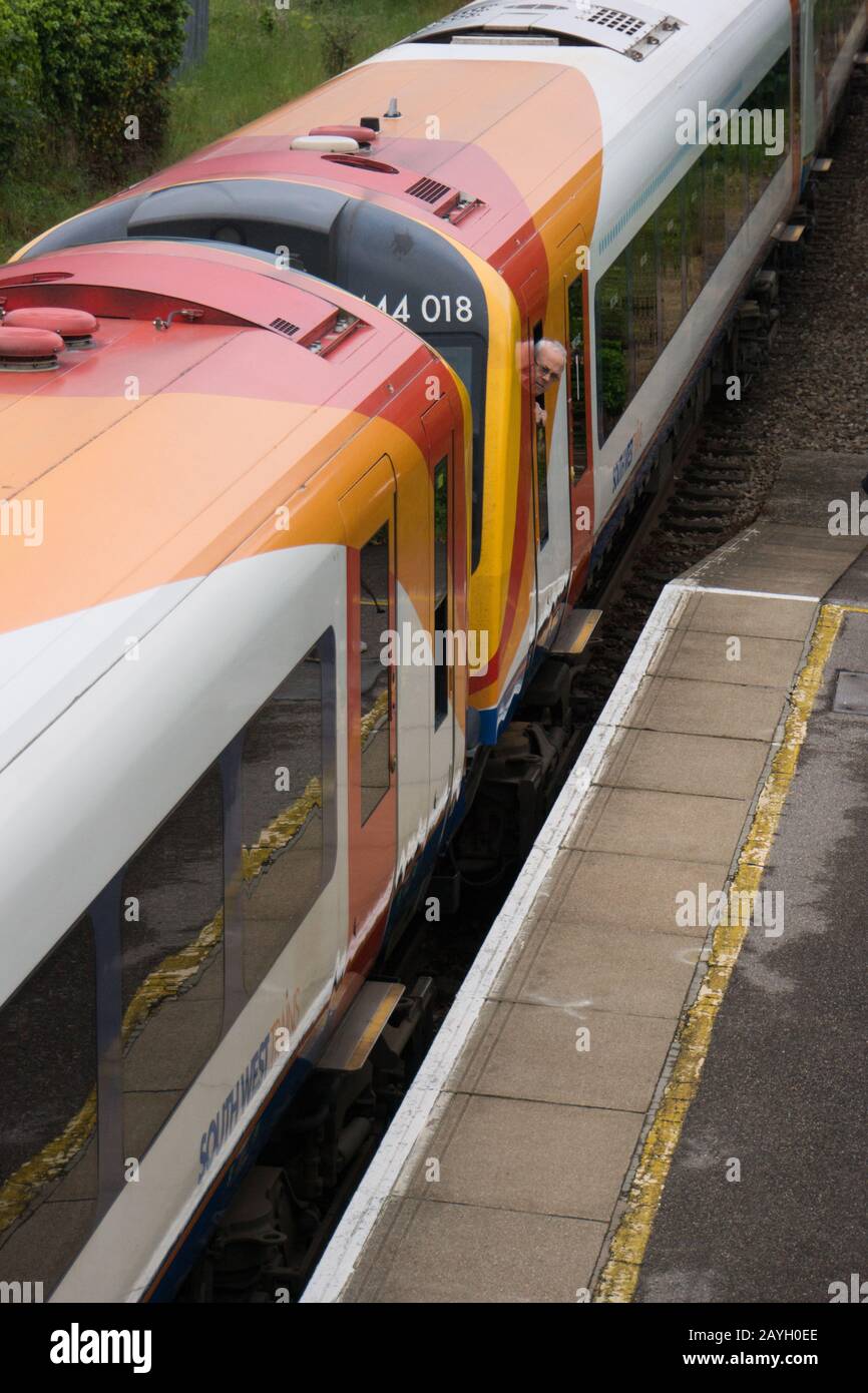 Two trains in platform hi-res stock photography and images - Alamy