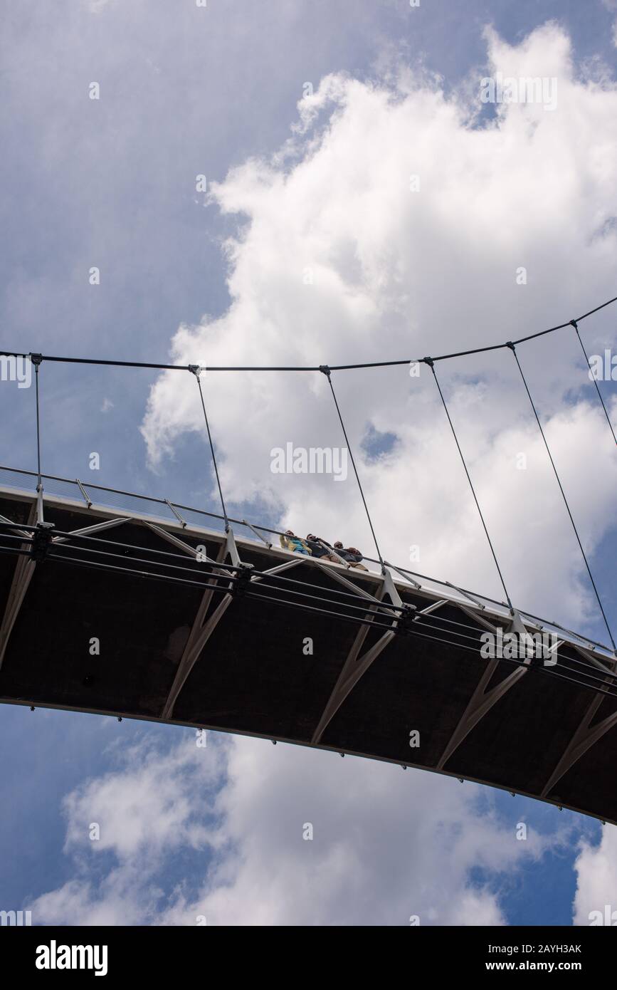 The Liberty Bridge at Falls Park at the Reedy is an iconic landmark in downtown Greenville ...