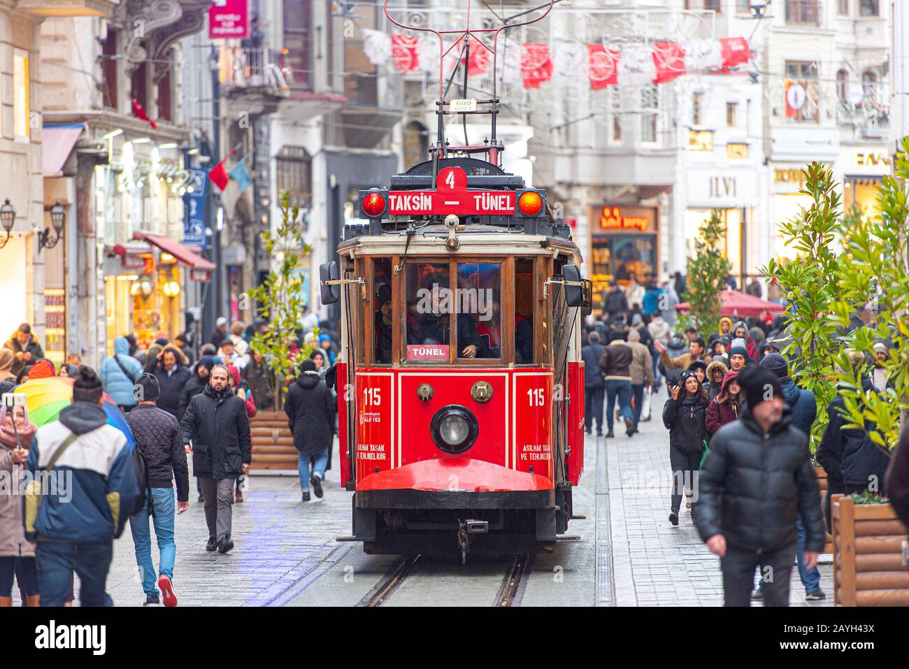 ISTANBUL - JAN 01: Famous retro red Tram on on Taksim Square and ...