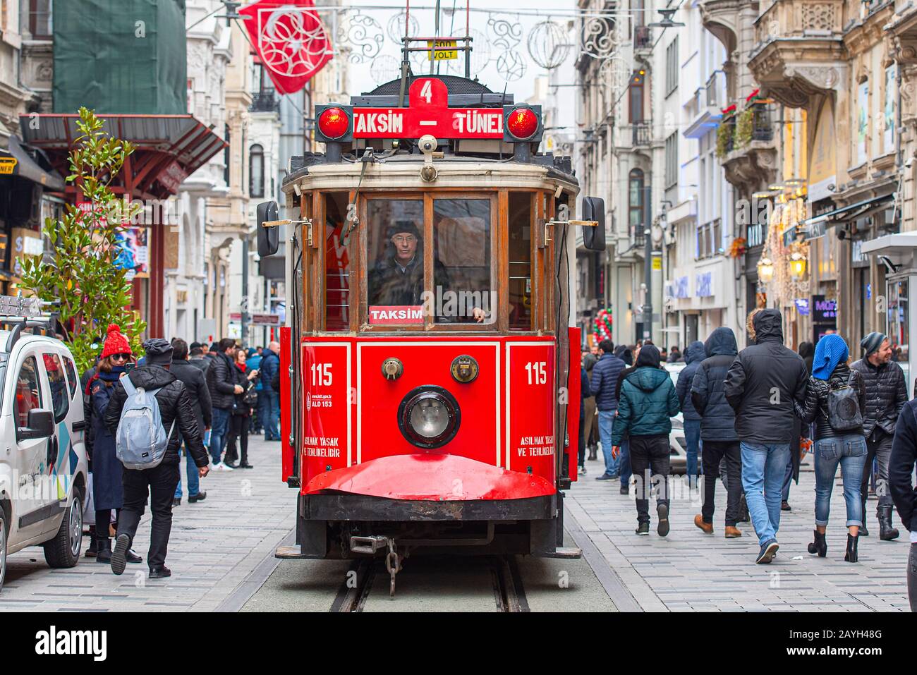 ISTANBUL - JAN 01: Famous retro red Tram on on Taksim Square and ...