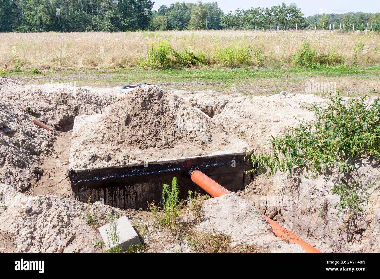New concrete septic tank - construction site Stock Photo - Alamy