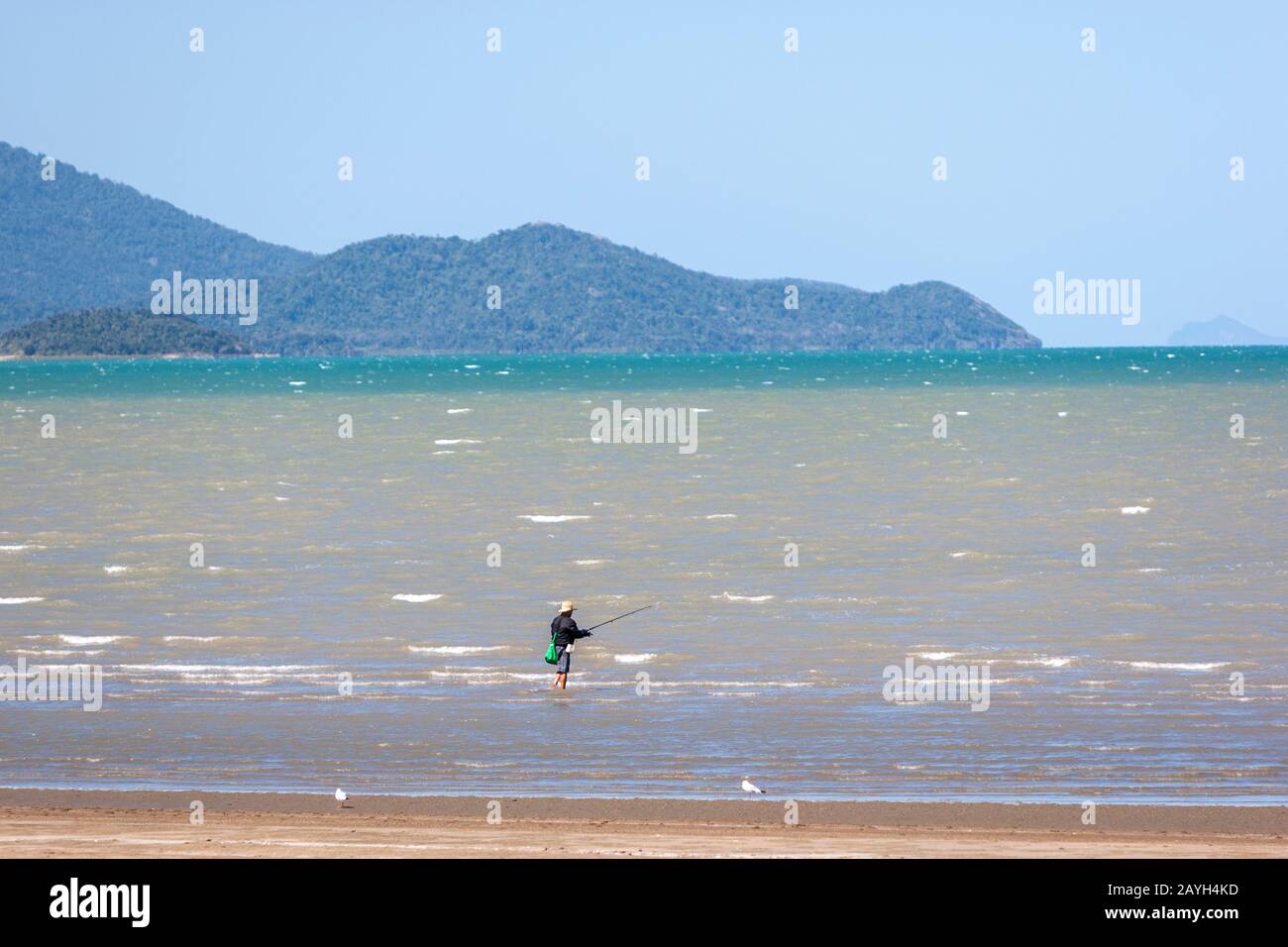Fishing with rod in Dingo Beach, Queensland, Australia Stock Photo - Alamy