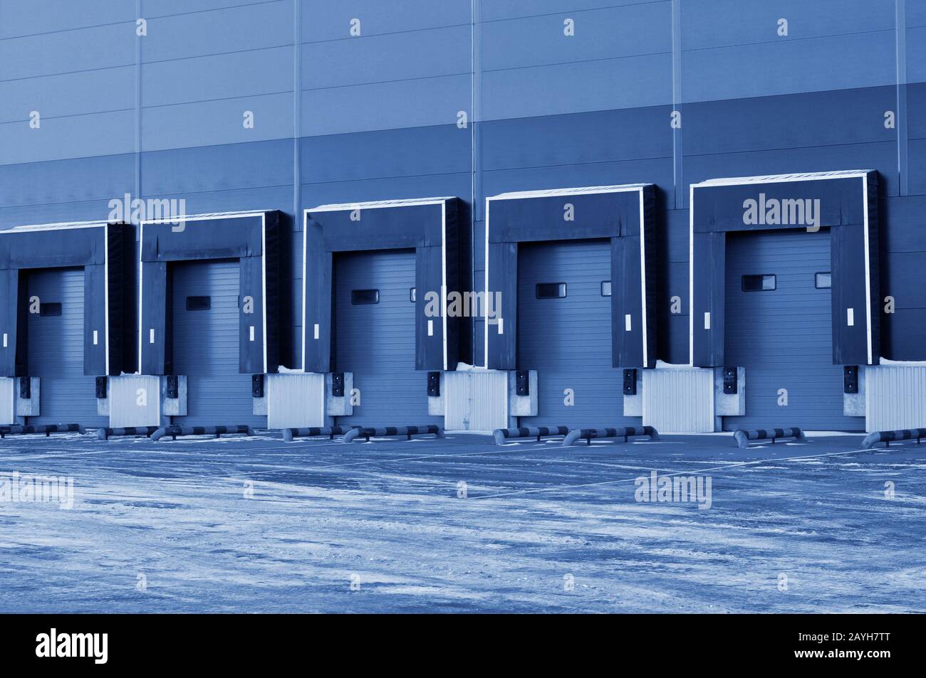 Front view of loading docks of a modern logistics center. Logistics ...