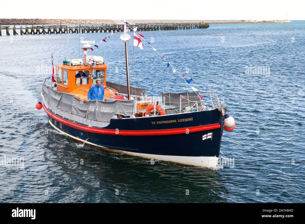 A Puffin Cruise boat at Amble, Northumberland Stock Photo - Alamy