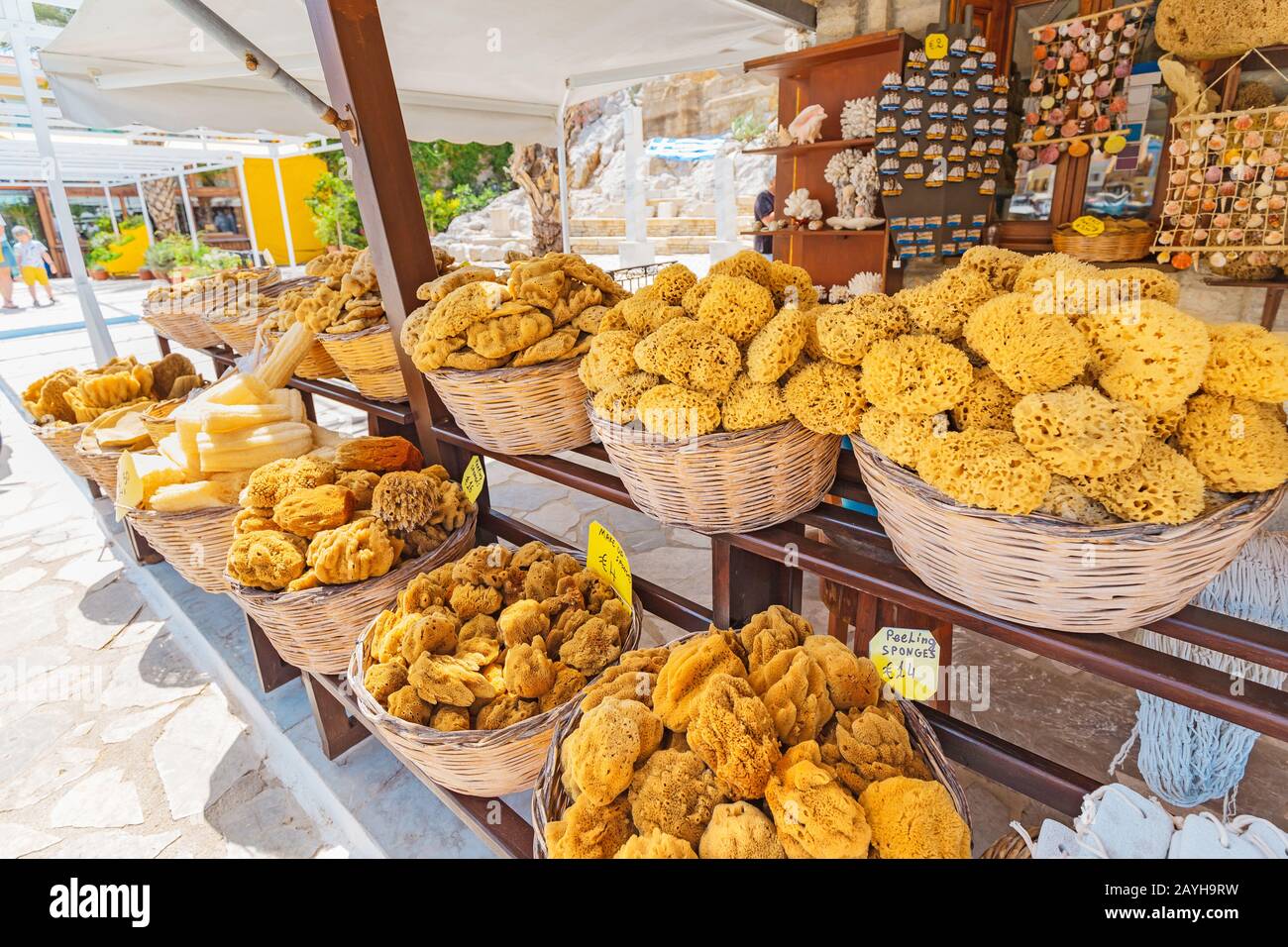 A marketplace selling bathing sponges to tourists Stock Photo - Alamy