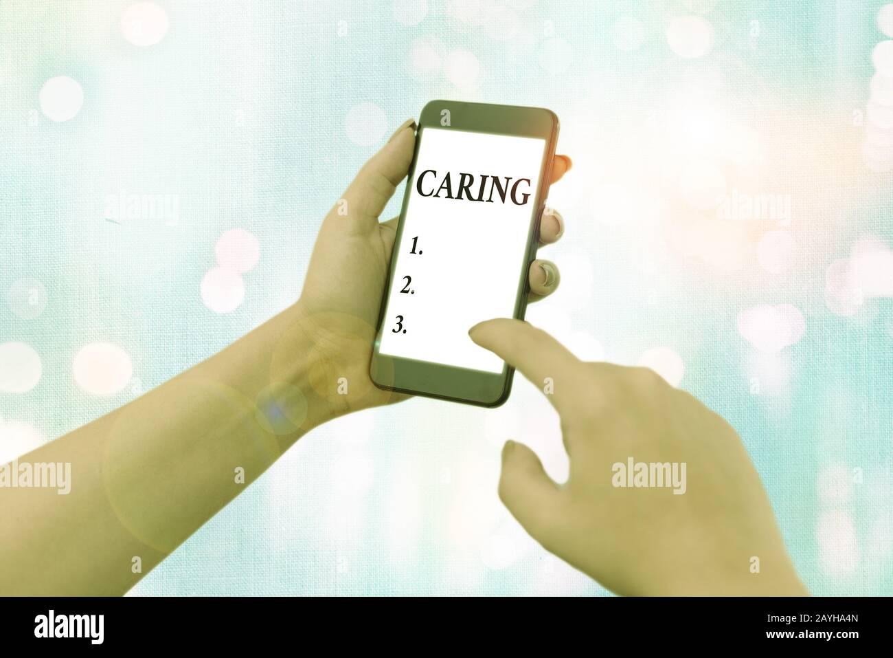 Conceptual hand writing showing Caring. Concept meaning practice of ...