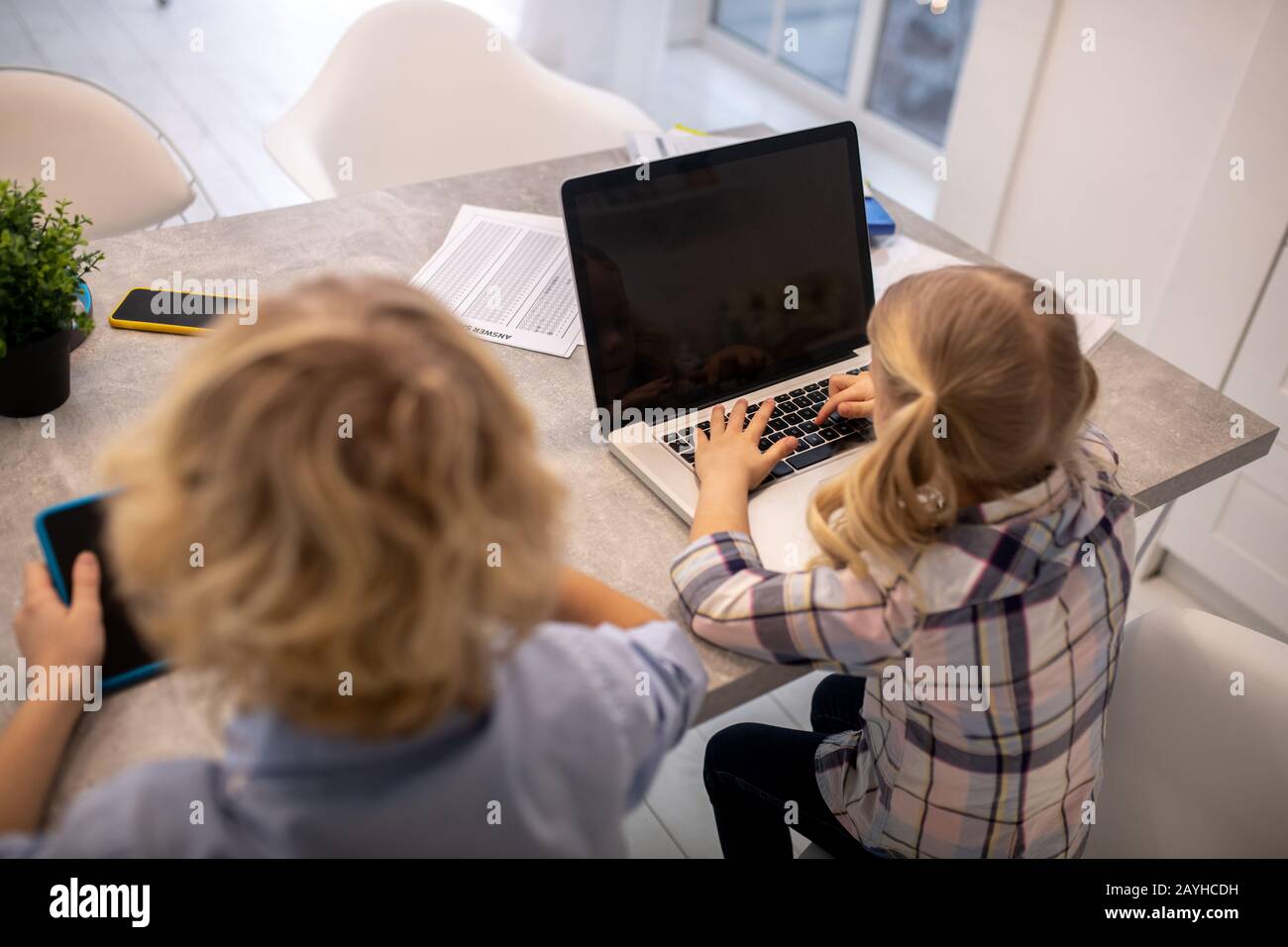 Table laptop information kids hi-res stock photography and images - Alamy