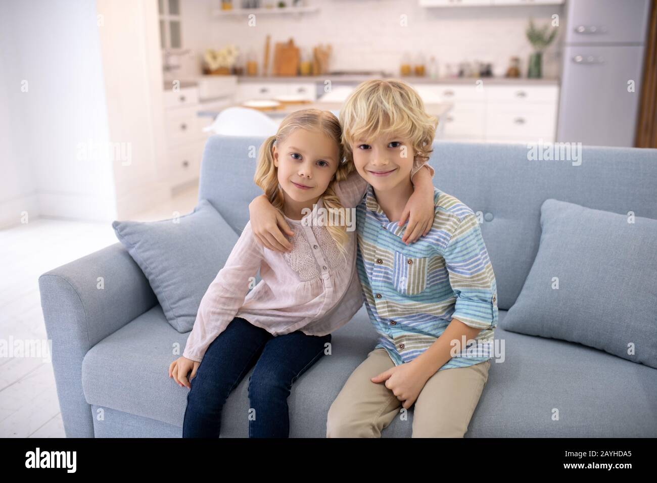 Two children hugging each other hi-res stock photography and images - Alamy