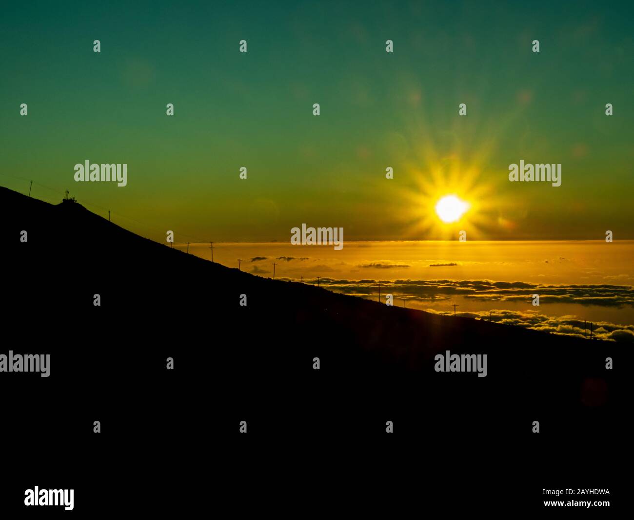 Sunset at the top of Haleakala Volcano, a popular destination in Maui ...