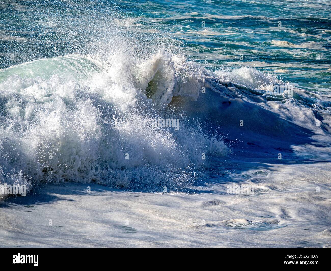 Big waves on the north shore of Oahu with aquamarine seas, white foam ...