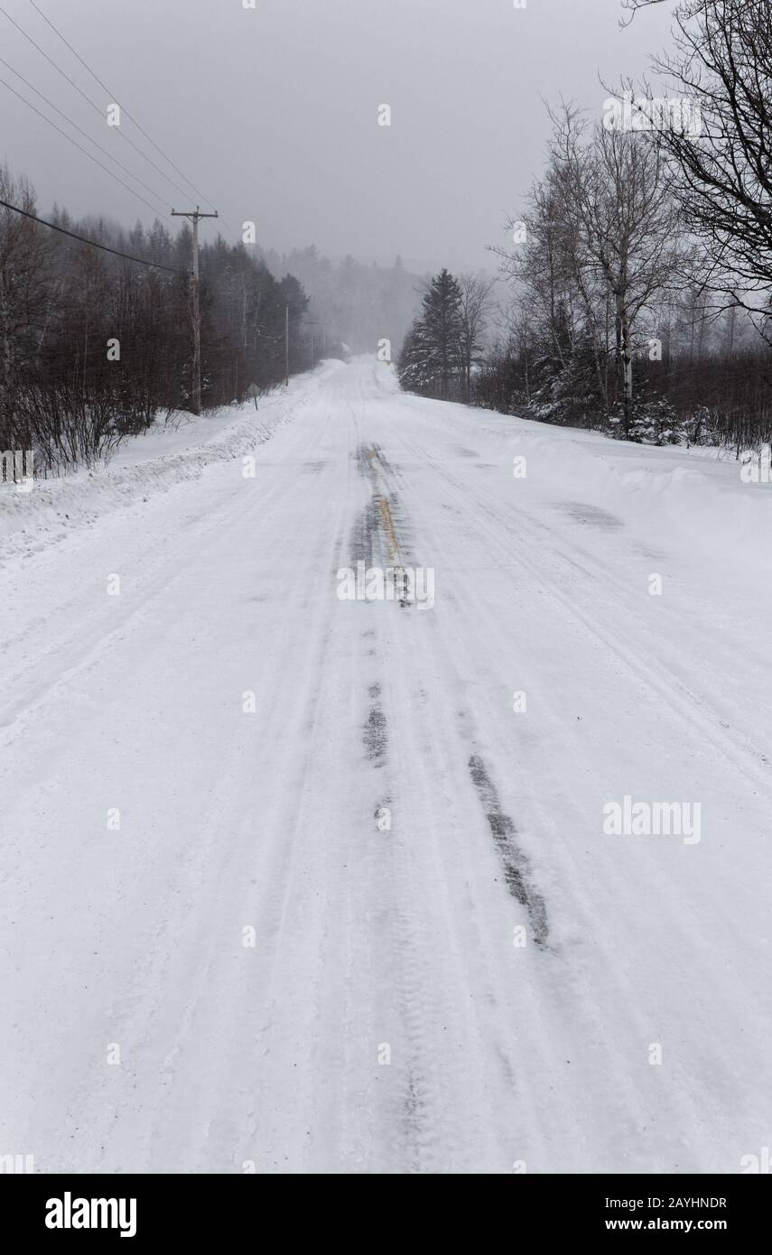Quebec,Canada. A snow covered rural road Stock Photo - Alamy