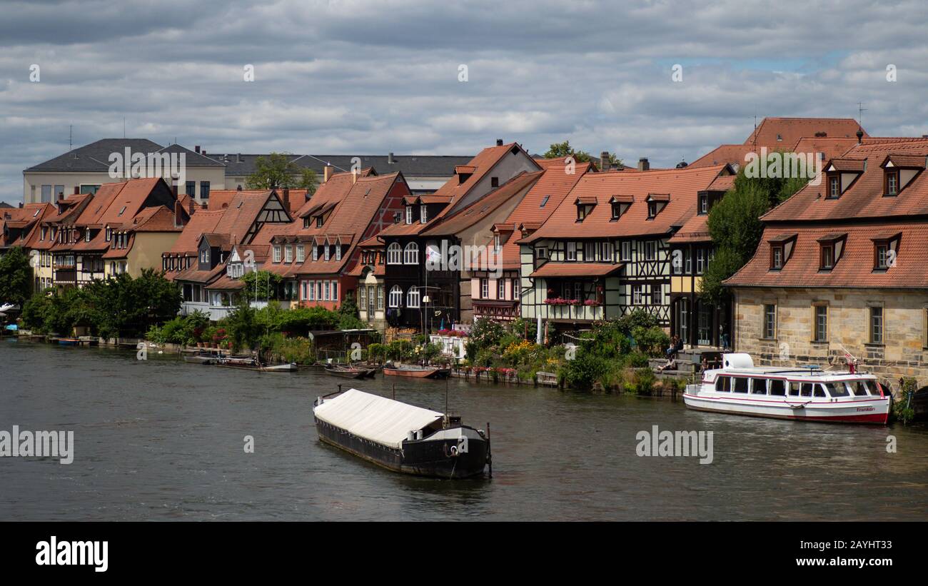 View over the Regnitz river toward the beautiful medieval buildings of ...