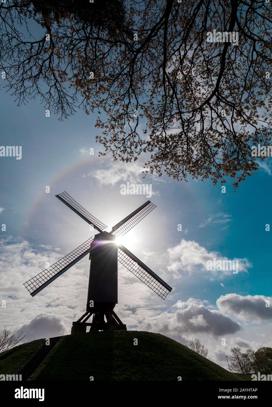 Traditional wooden windmill. Green energy concept. Environmental ...