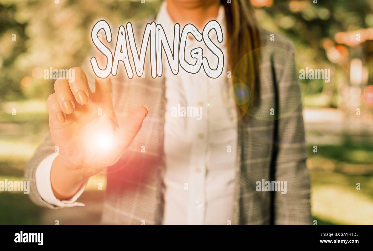 Word writing text Savings. Business photo showcasing the money that a ...