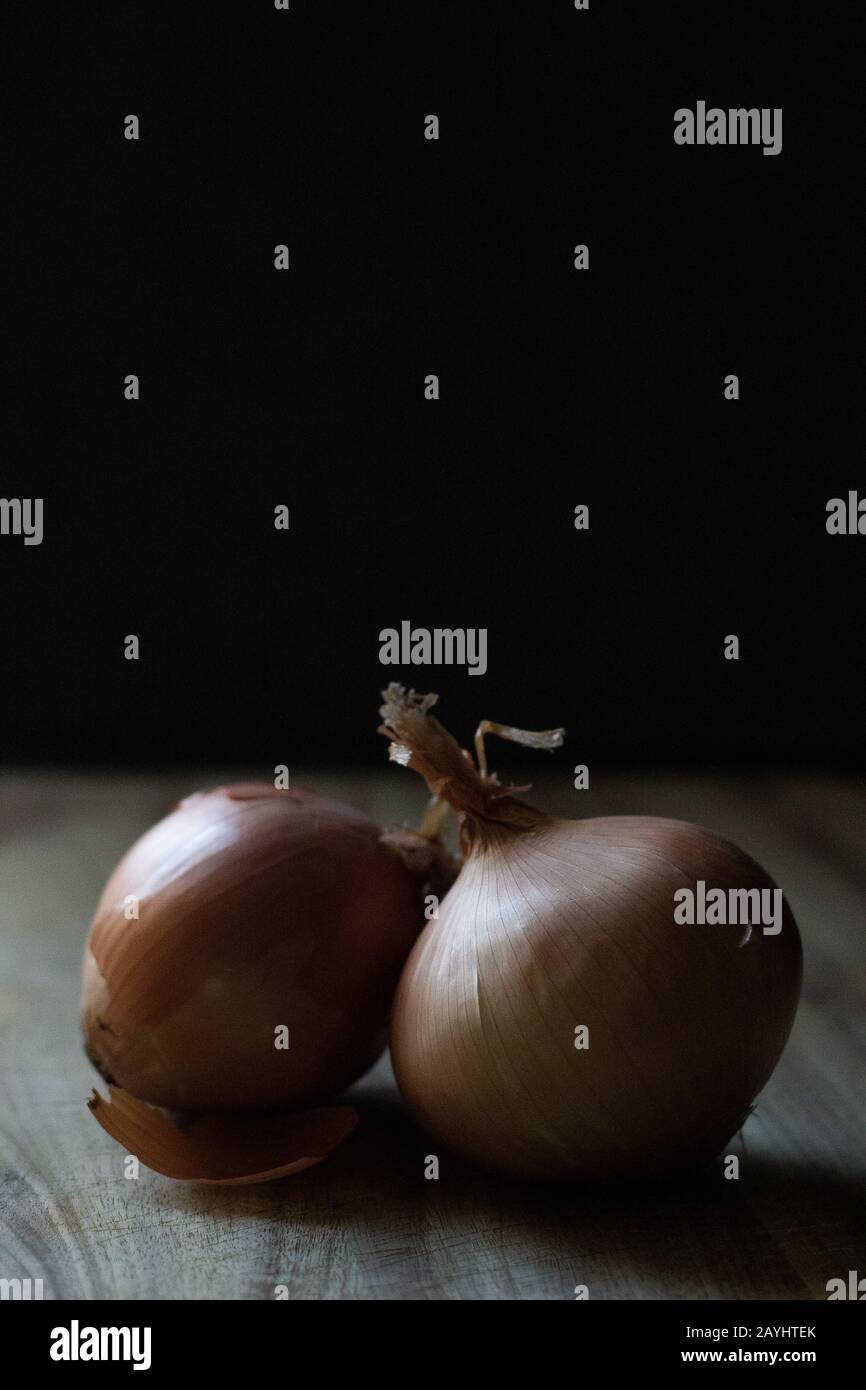 Simple picture of two yellow onions Stock Photo - Alamy