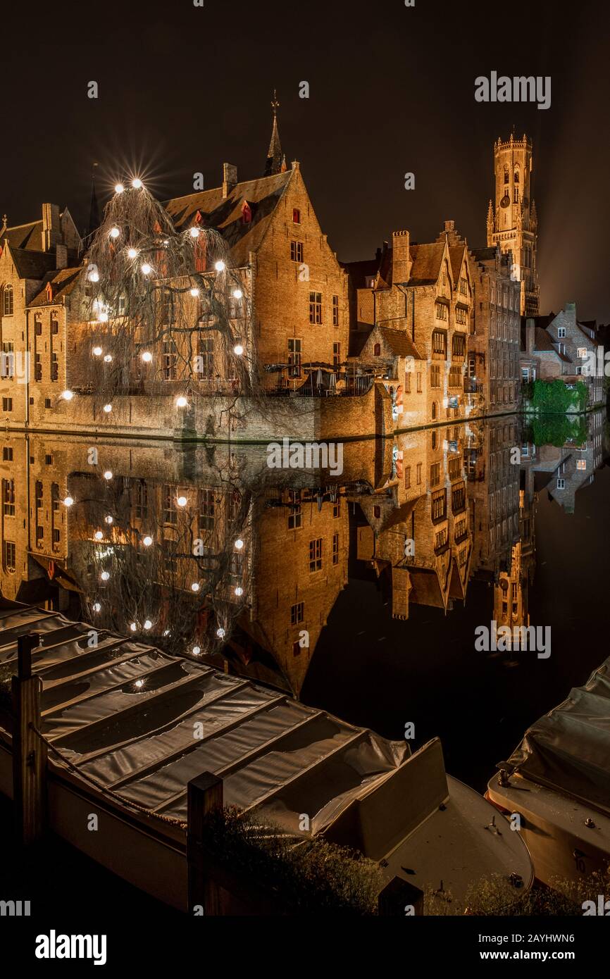 An evening photo of the market square in Bruges with a perfect ...