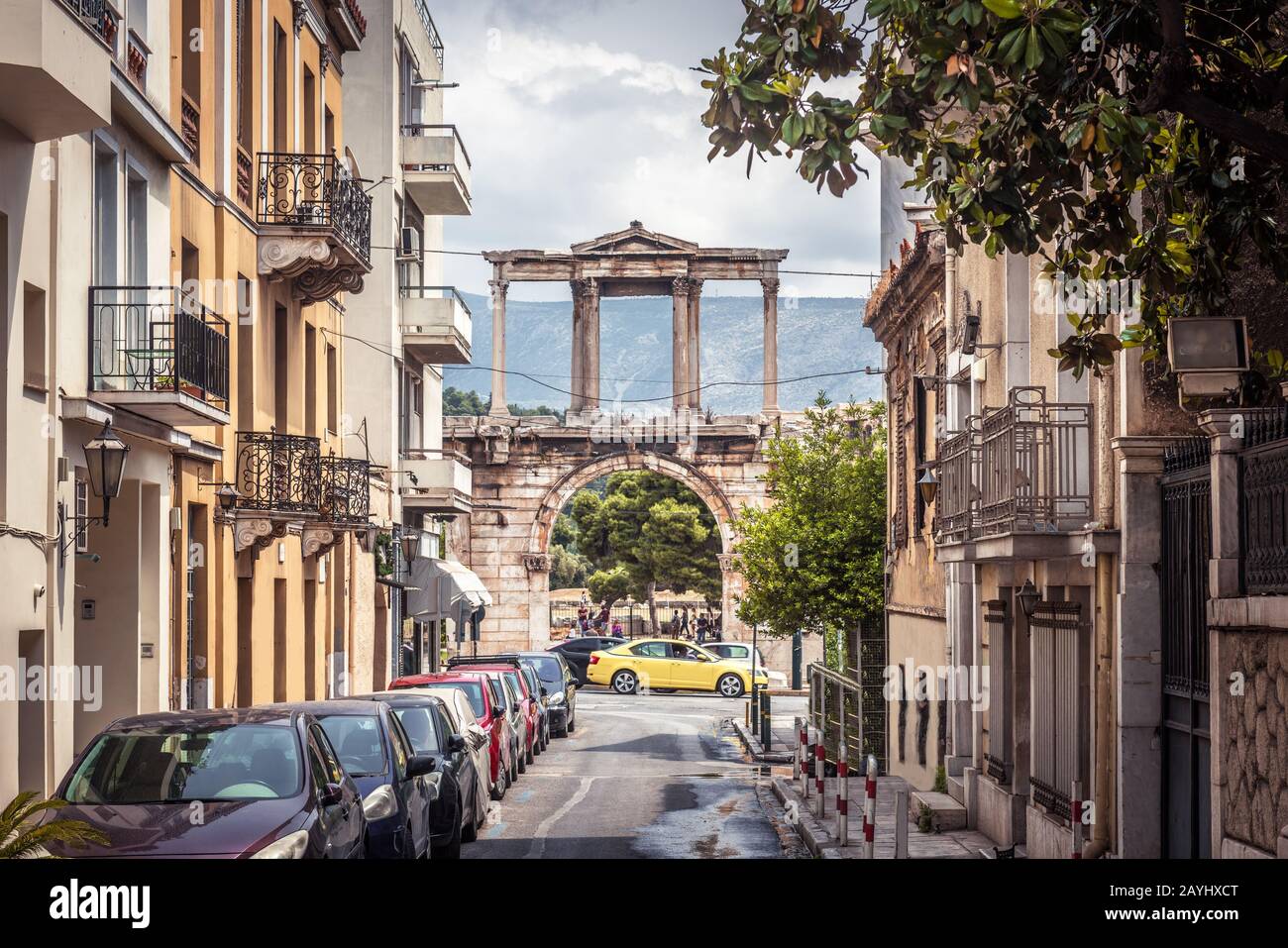 Street in Athens overlooking the ancient Hadrian's Gate or Arch of ...