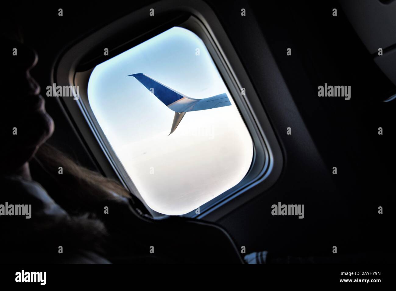 The winglet wingtip of a commercial passenger plane in flight with part ...