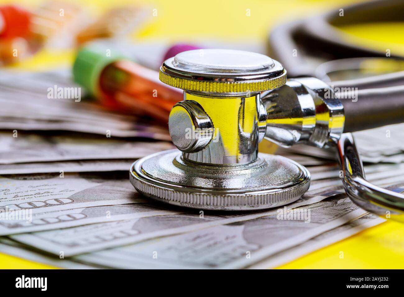 Close up of metal stethoscope for diagnosis test tubes with blood ...