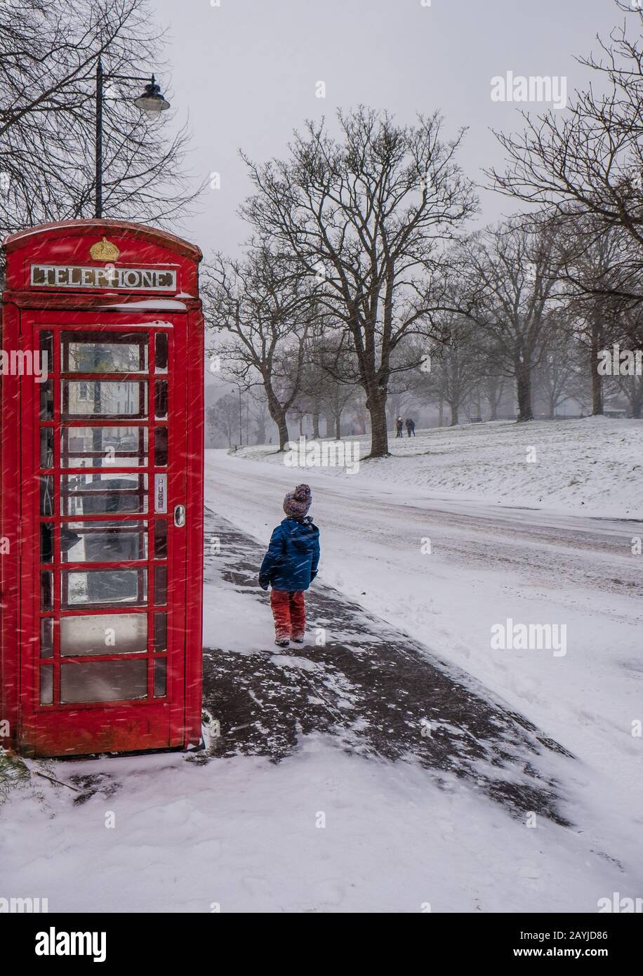 Child in telephone booth hi-res stock photography and images - Alamy