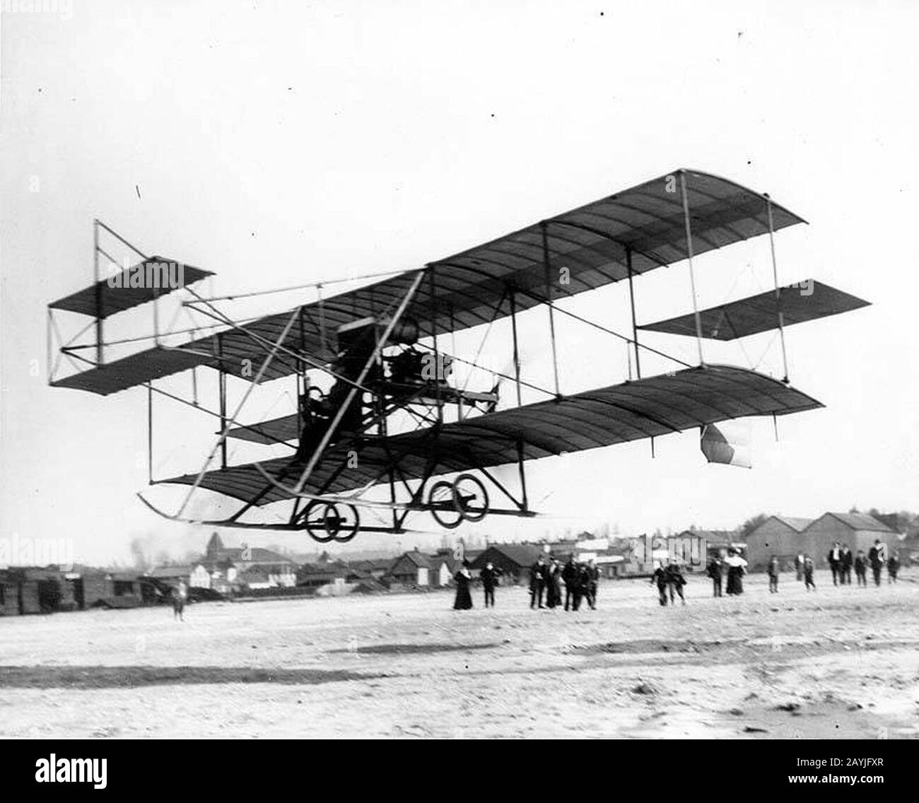 Fred J Wiseman piloting the first airplane (biplane) to land at the ...