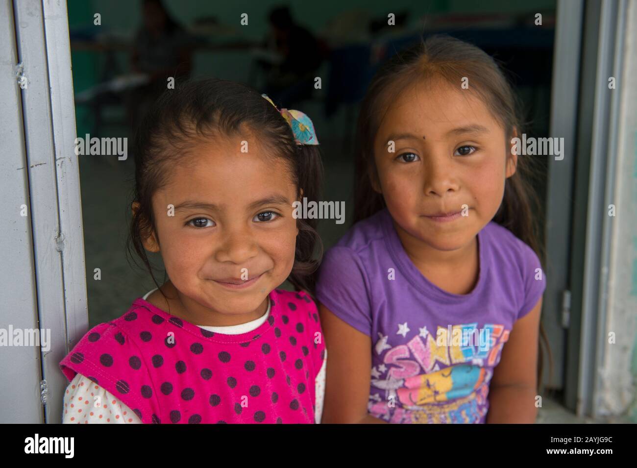 Portrait of two girls in the Mixtec village of San Juan Contreras near ...