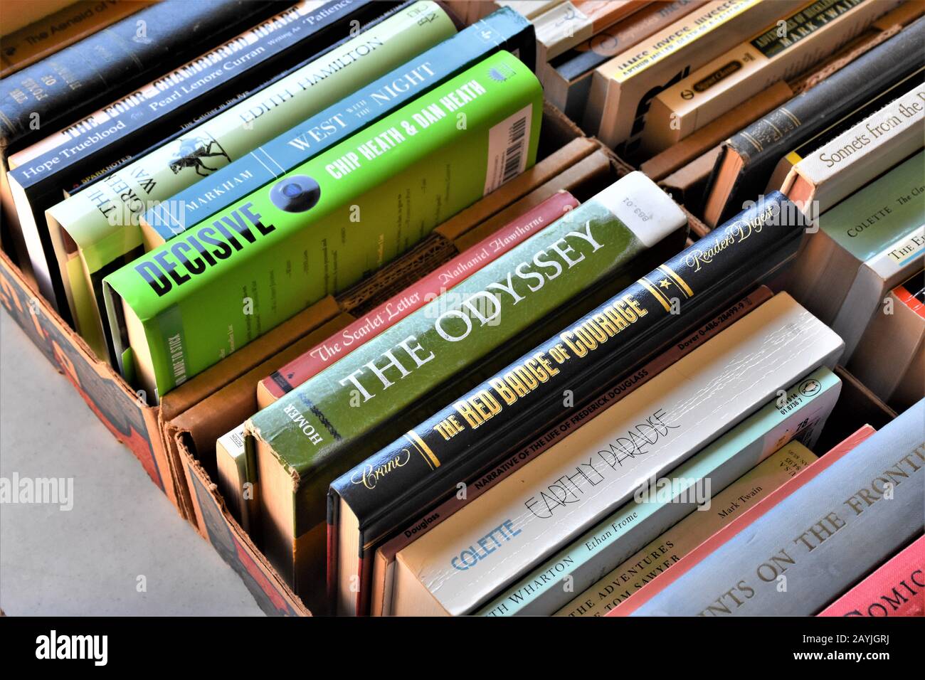 used books for sale, Decisive, the Odyssey, at a library Stock Photo ...