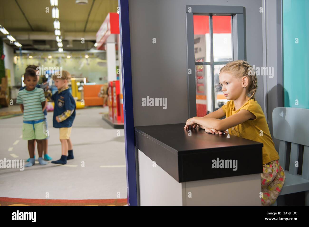 Childrens role game in game center Stock Photo - Alamy