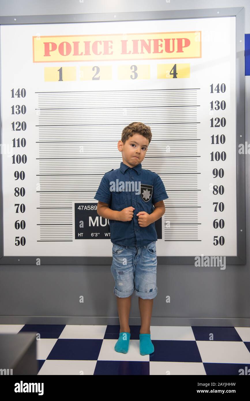Boy criminal in prison at playground Stock Photo - Alamy