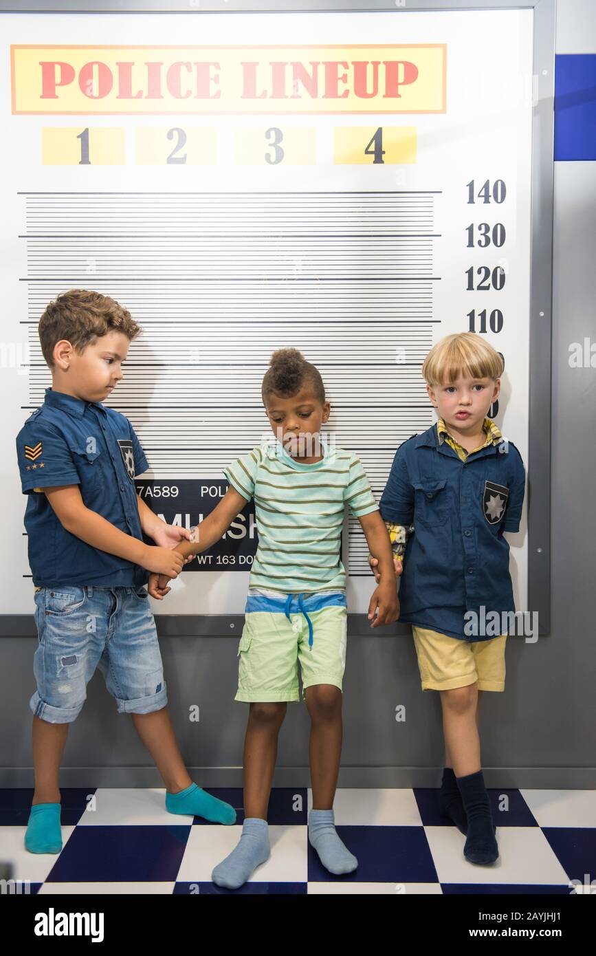 Kids playing police and criminal at childrens game center Stock Photo ...