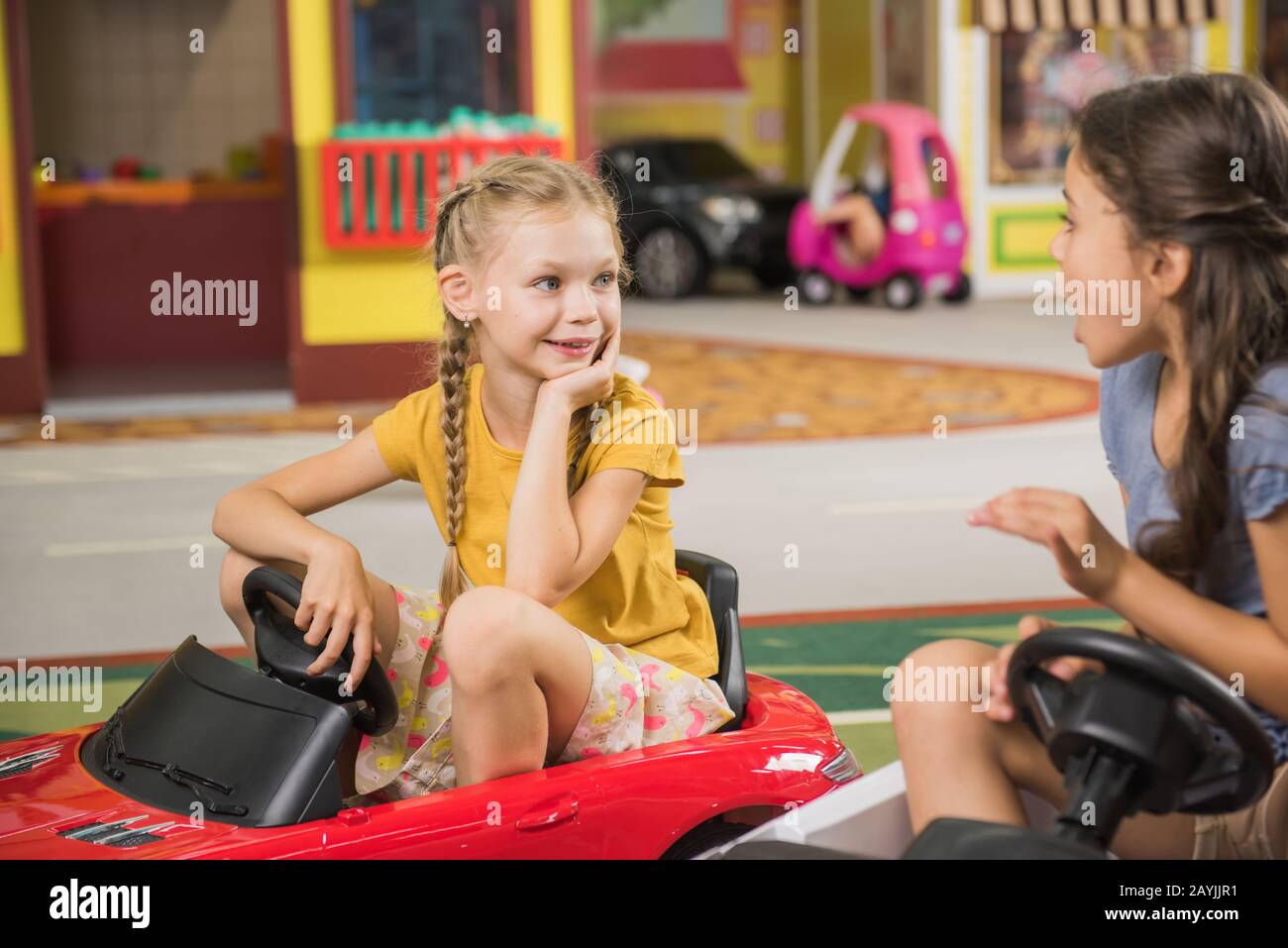 Little girls having fun in leisure center for kids Stock Photo - Alamy