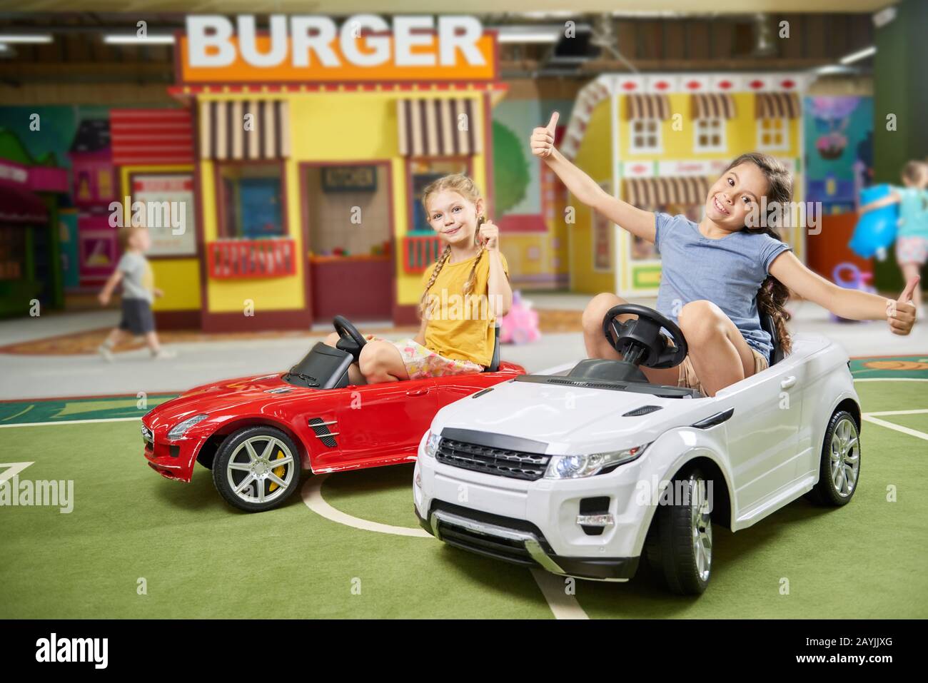 Little girls having fun in leisure center for kids Stock Photo - Alamy
