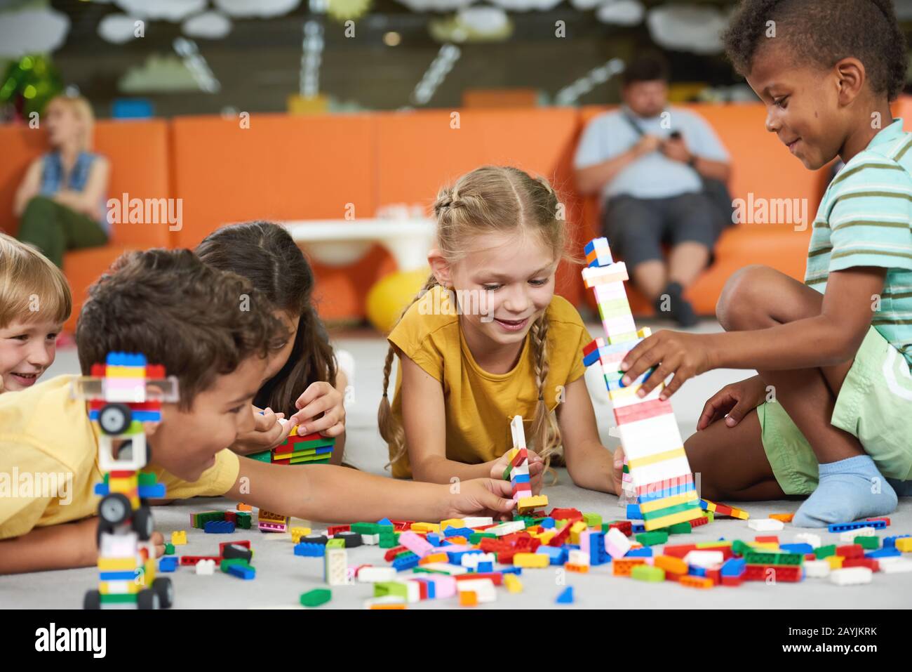 Children building blocks in kindergarten Stock Photo - Alamy