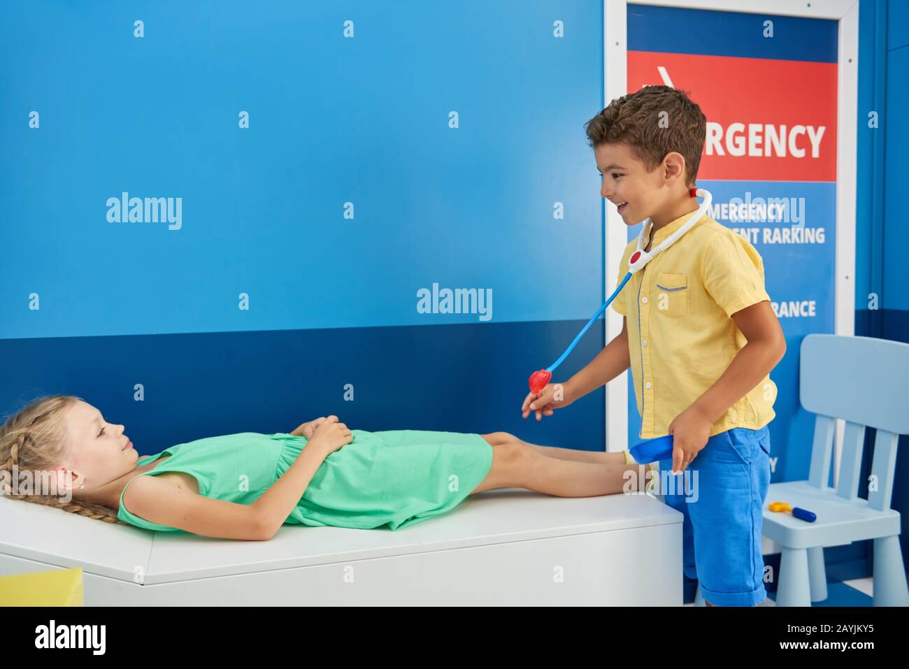 Children playing doctor and patient Stock Photo - Alamy