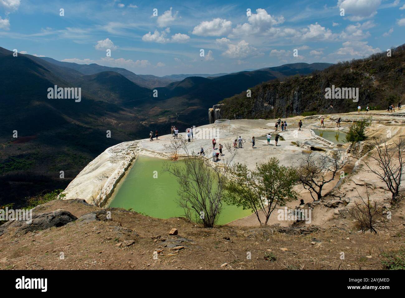 People bathing in the artificial pool filled with water from fresh ...