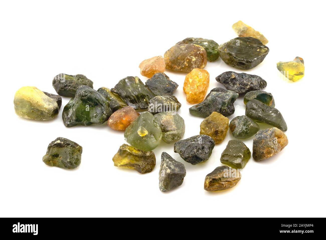 A collection of uncut natural sapphires isolated on a white background ...