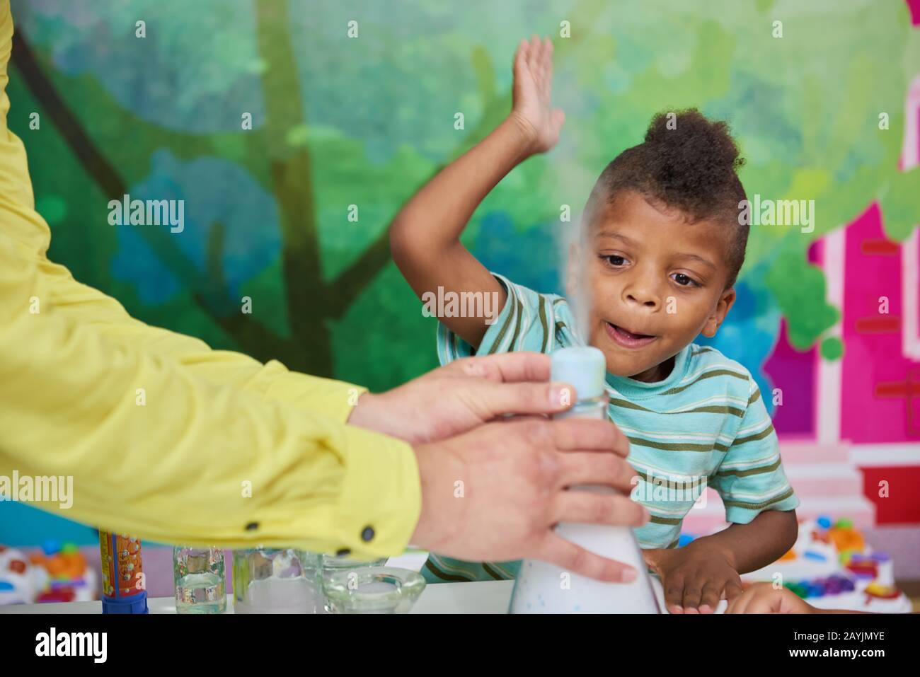 Child boy playing with chemical liquid Stock Photo - Alamy