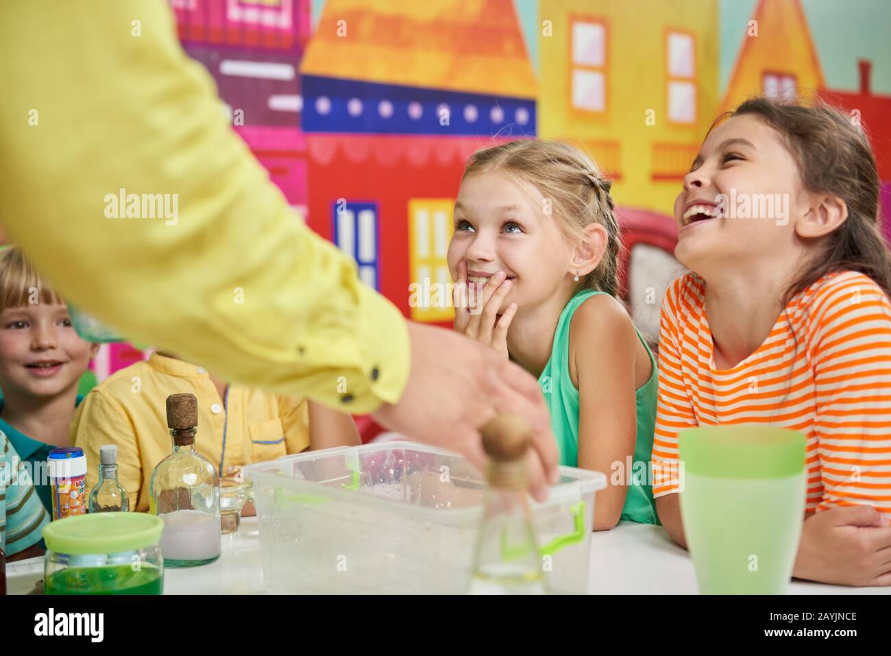Happy smiling children watching science experiment Stock Photo - Alamy