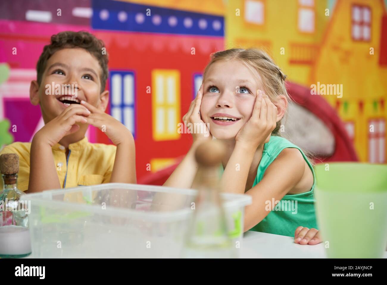 Adorable kids having fun in entertainment center Stock Photo - Alamy