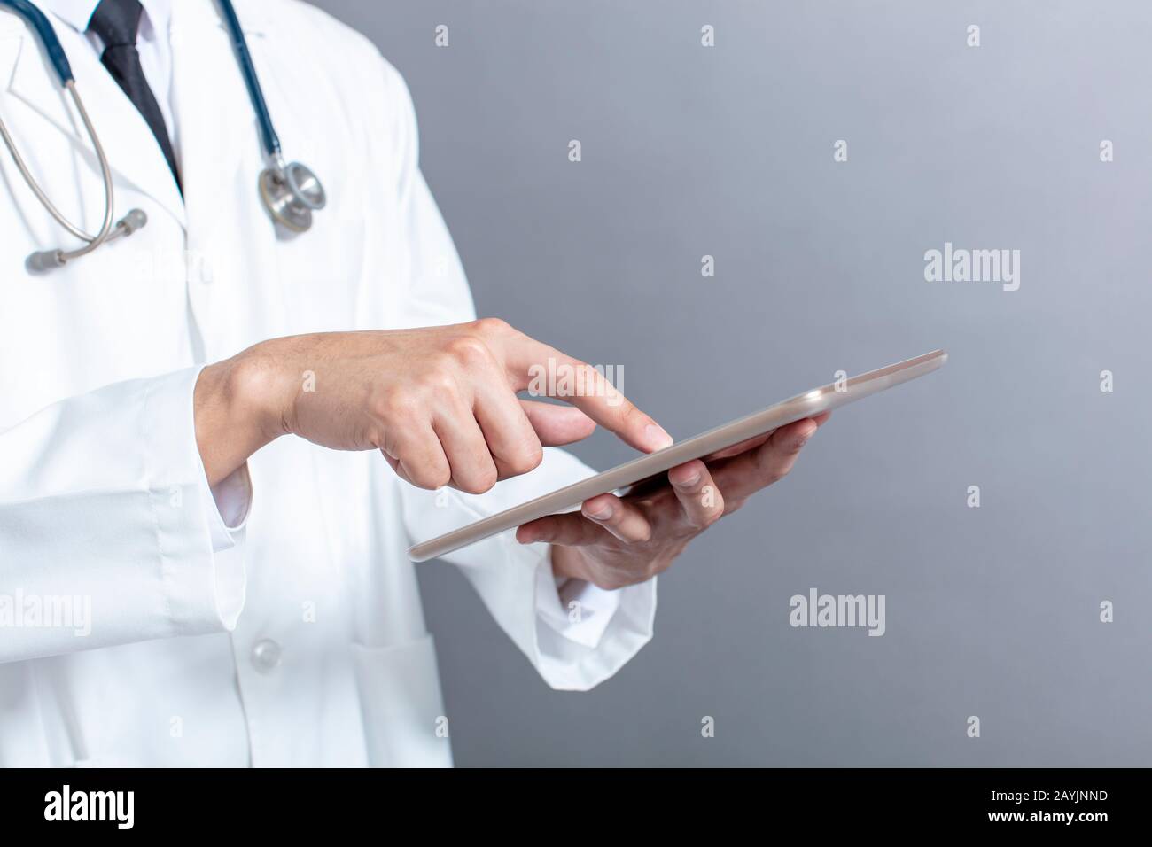 Doctor with touch tablet hi-res stock photography and images - Alamy