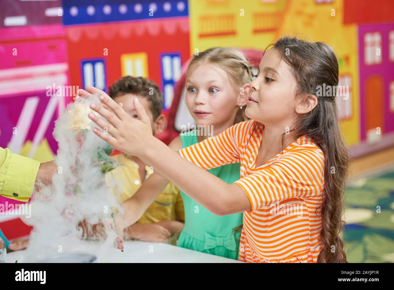 Happy kids having fun in entertainment center Stock Photo - Alamy