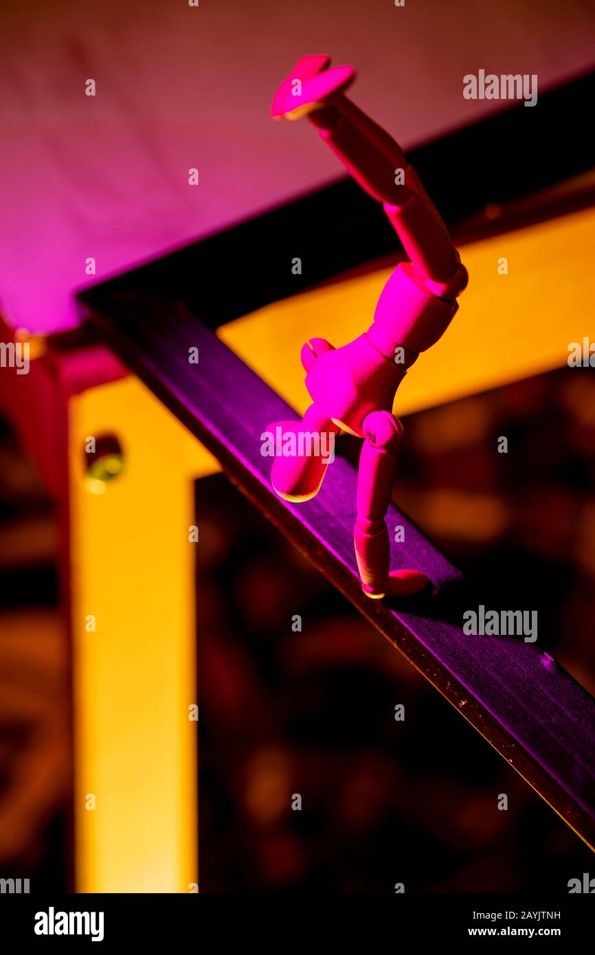 Wooden manikin balancing on picture frame- concept of creativity Stock ...