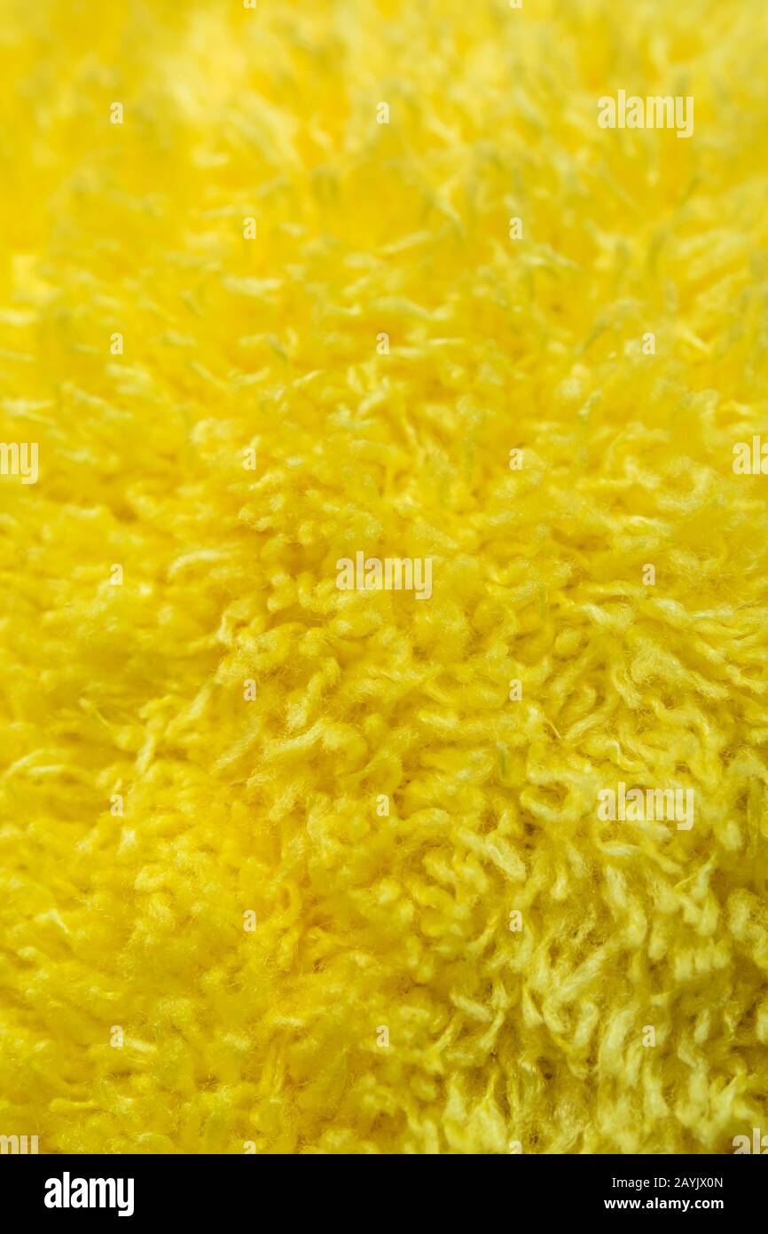 Yellow Fur of fabric surface texture Stock Photo - Alamy