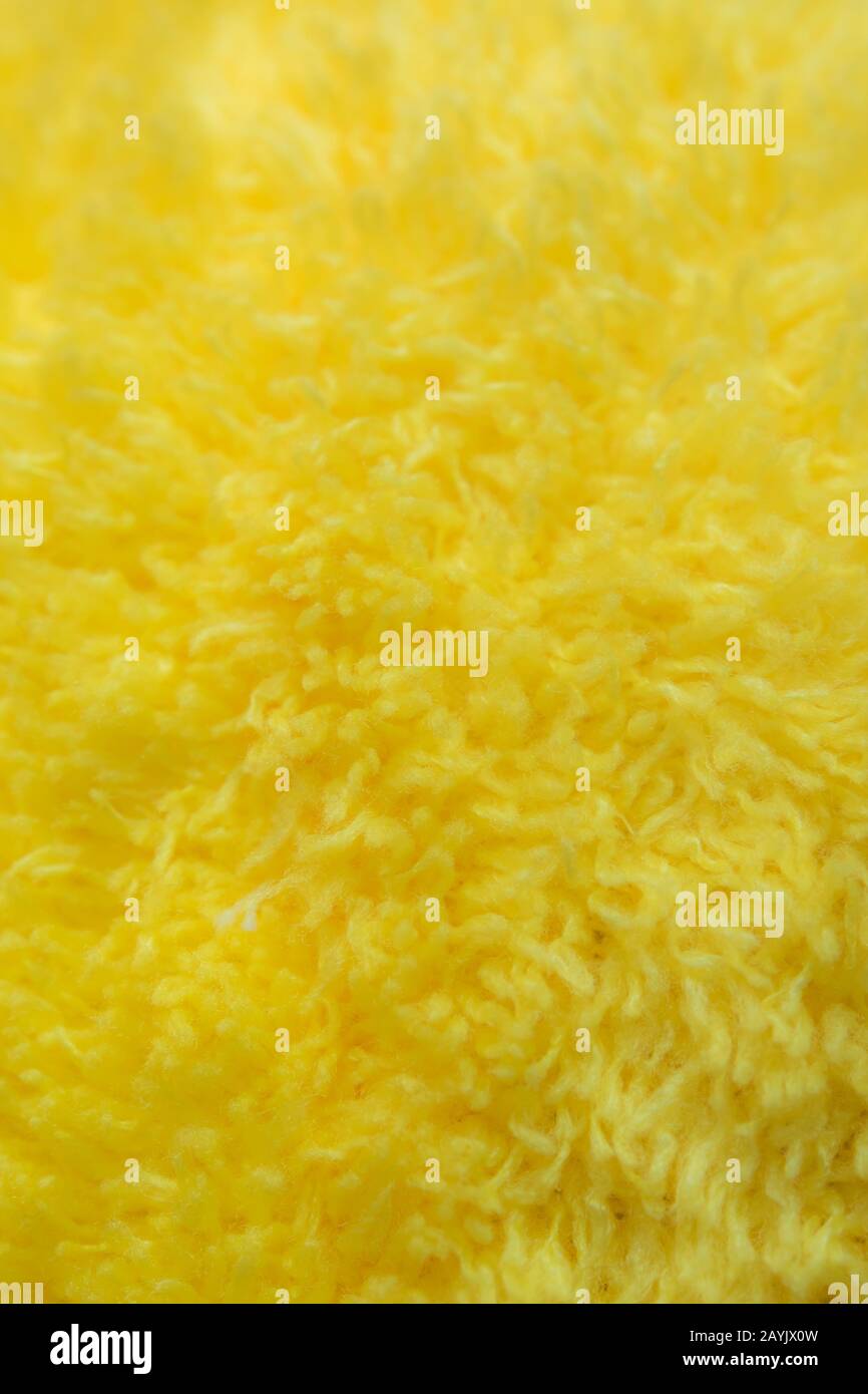 Yellow Fur of fabric surface texture Stock Photo - Alamy