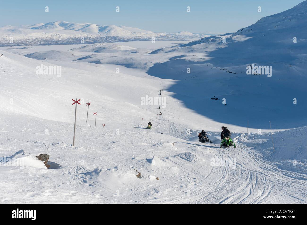 A snowmobile excursion is arriving at the Laktatjakko Mountain Station ...
