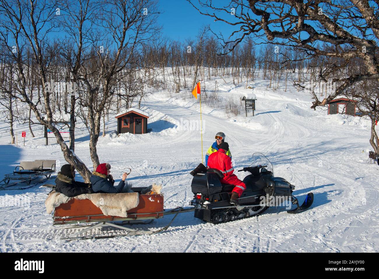 A snowmobile excursion is leaving from the Hotel Fjallet, the ...